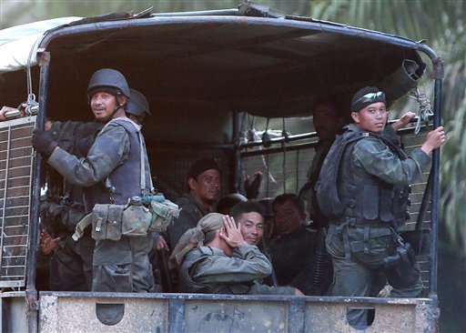 Armed Filipinos in Sabah elusive after Malaysian assault | Global News