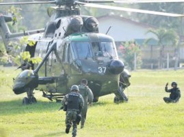 Malaysia attacks Filipinos to end Sabah siege | Global News