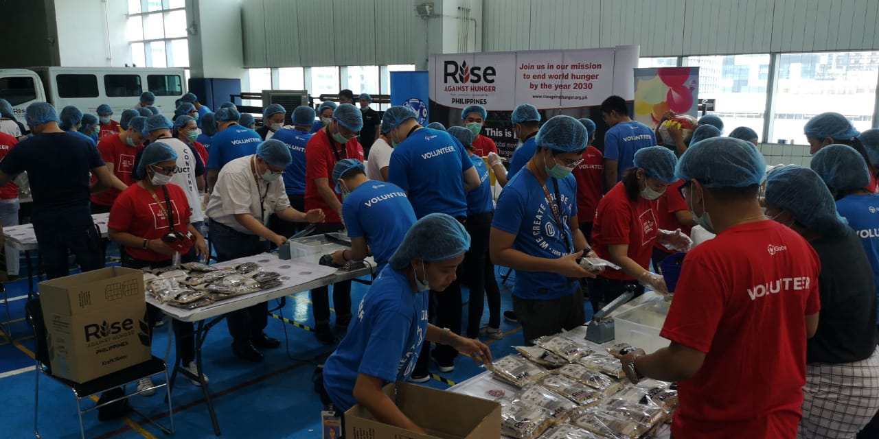 Globe and affiliates hold meal-packing activity for Typhoon Tisoy ...