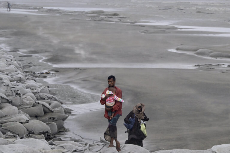 Cyclone hits Bangladesh, nearly a million flee inland for shelter