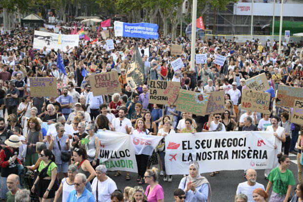 Barcelona residents protest against mass tourism