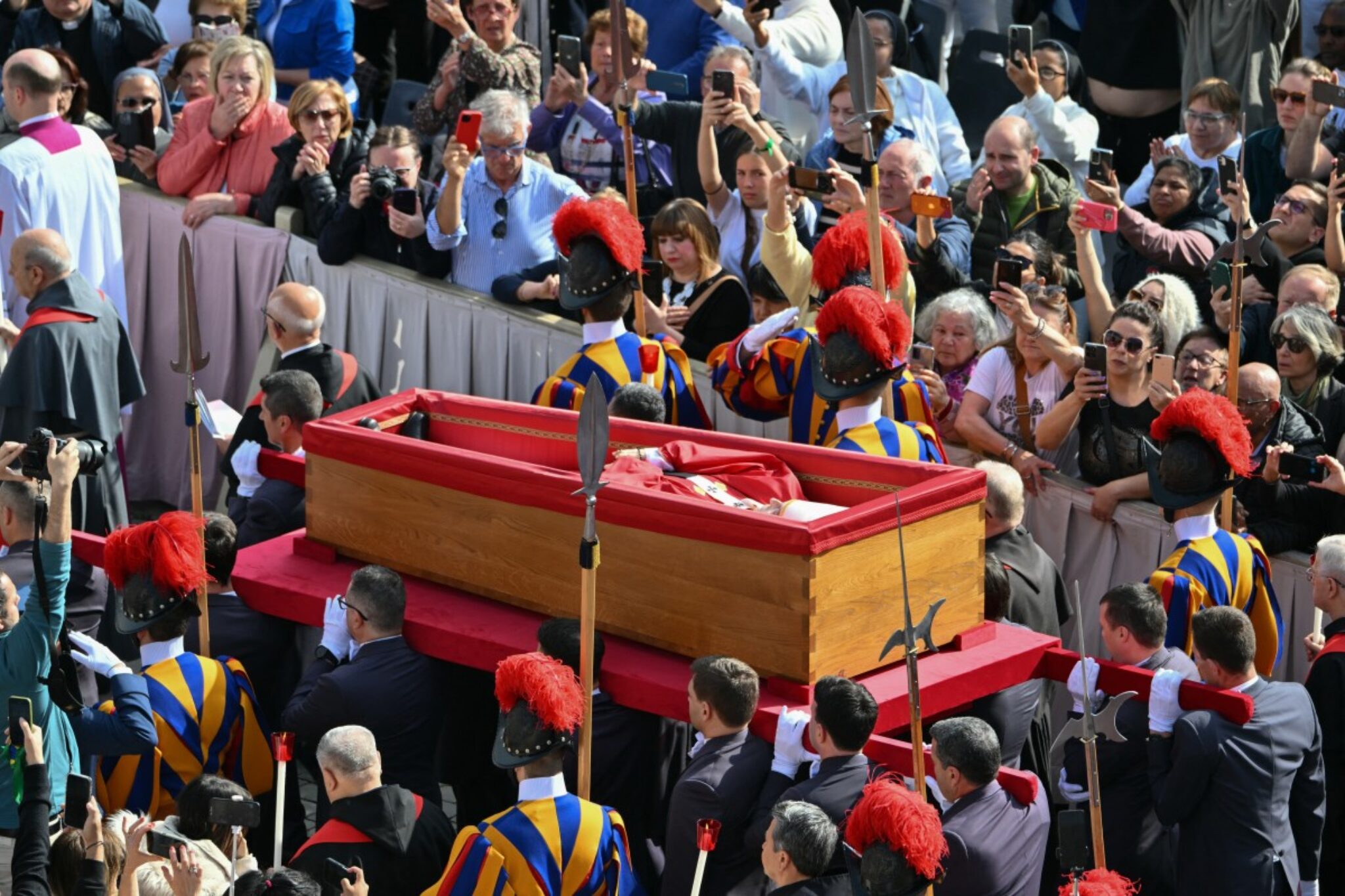 Pope Francis' coffin begins march towards St. Peter's Basilica