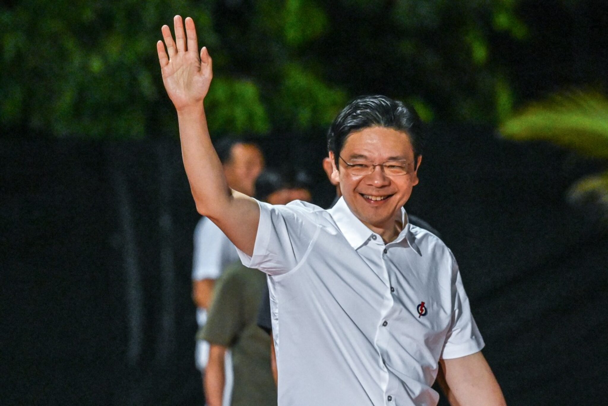 Singapore PM unveils new cabinet after landslide election