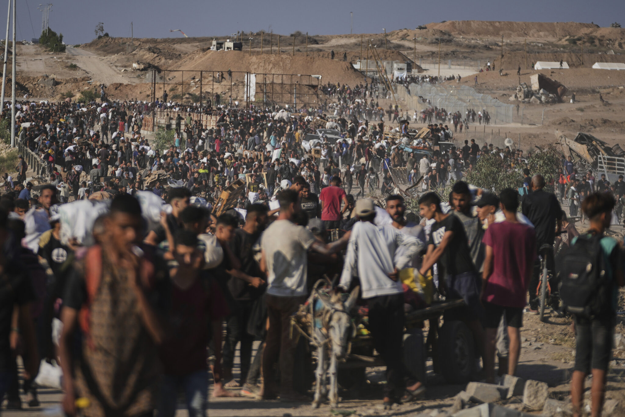 Israeli strike kills 18 Palestinians as turmoil mounts over food